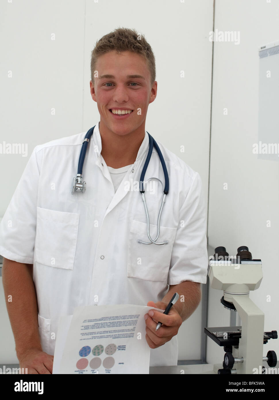 Glad doctor explaining good test results Stock Photo - Alamy