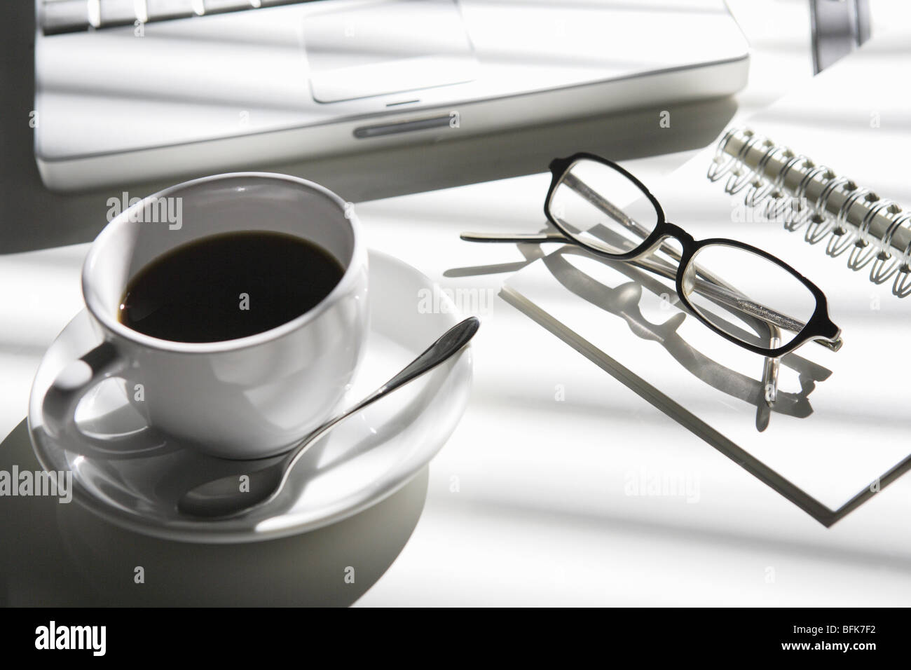 Laptop Coffee and Glasses Stock Photo - Alamy