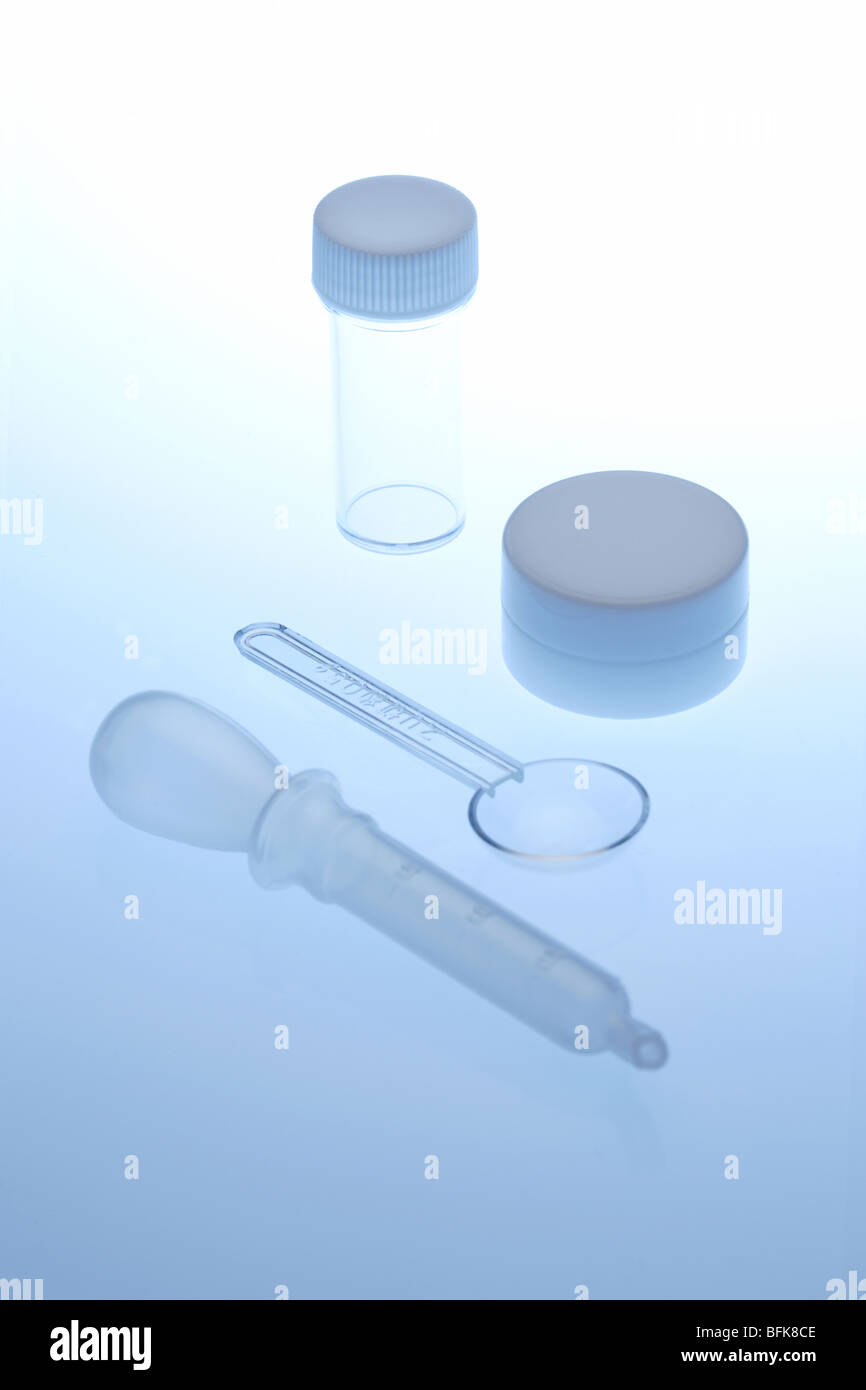 Laboratory equipment blue background Stock Photo - Alamy