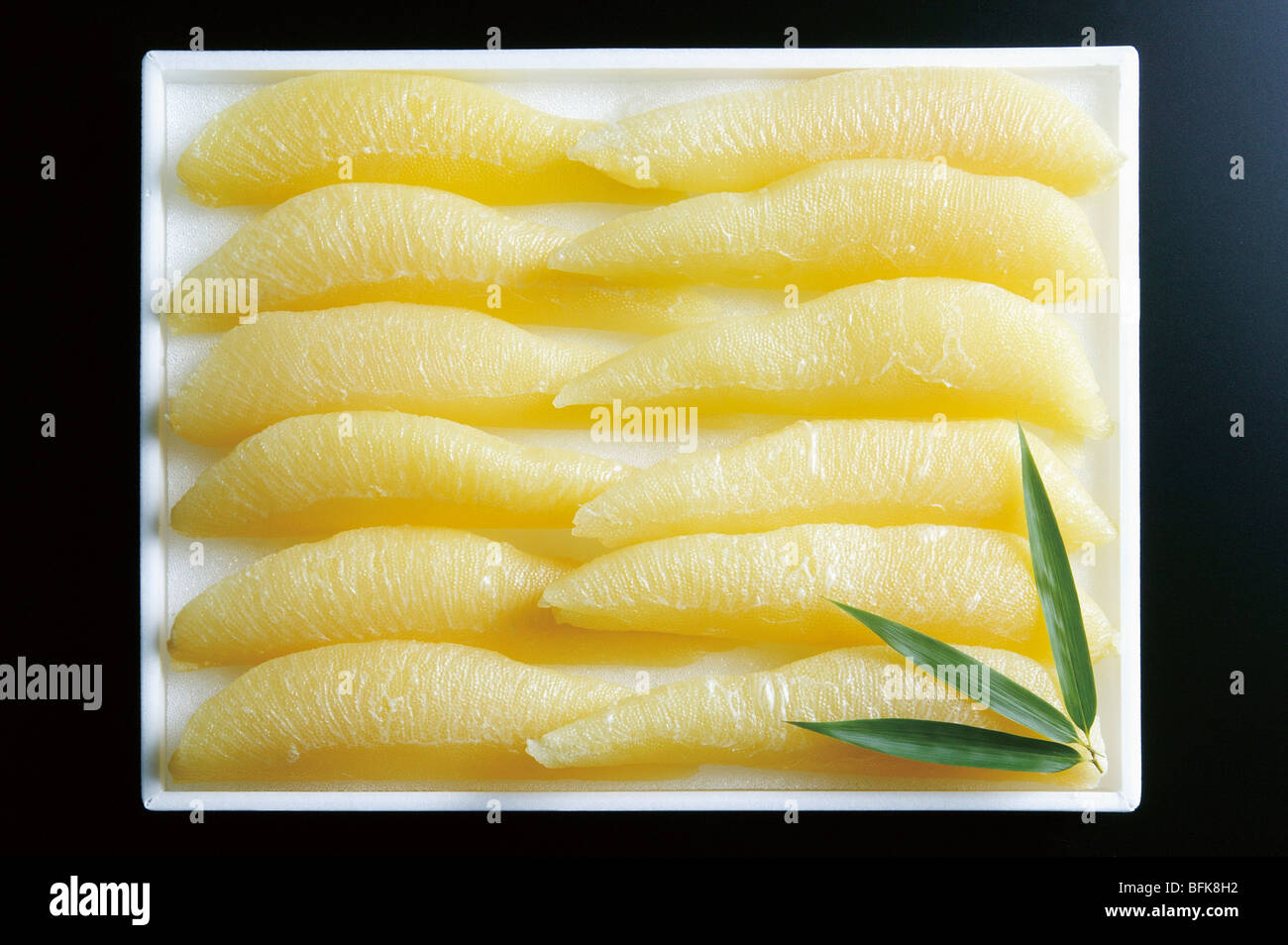 Herring roe black background Stock Photo - Alamy