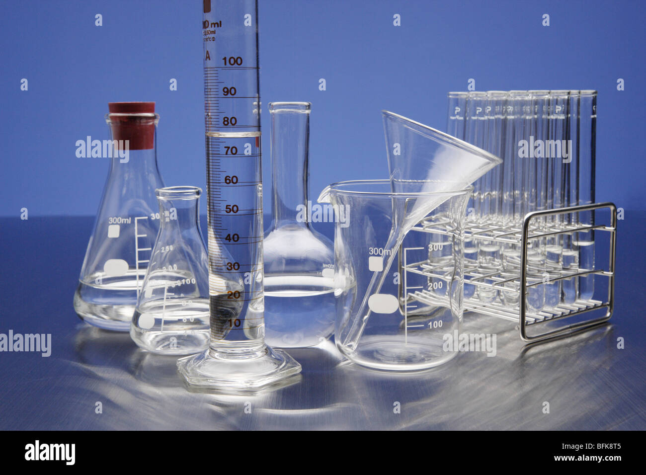 Laboratory equipments blue background Stock Photo - Alamy