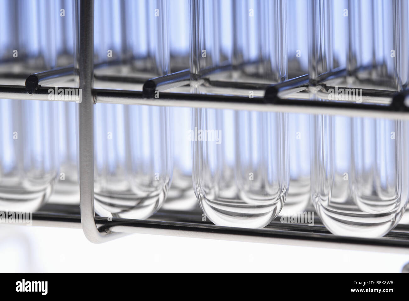 Test tubes in rack close up white background Stock Photo - Alamy