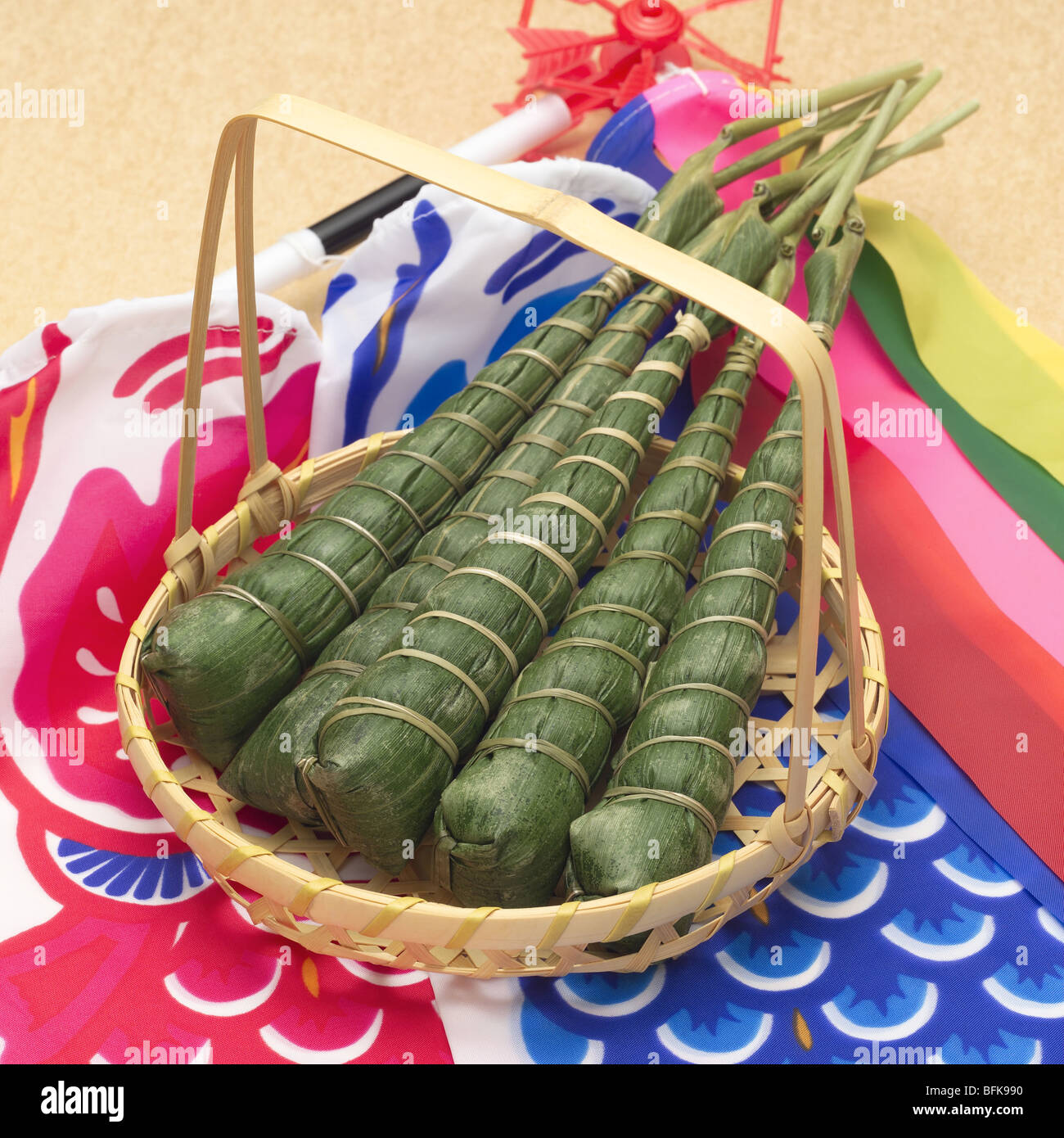 Cooked rice wrapped in leaves Stock Photo - Alamy