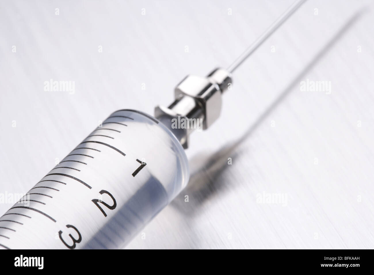Syringe with needle Stock Photo - Alamy