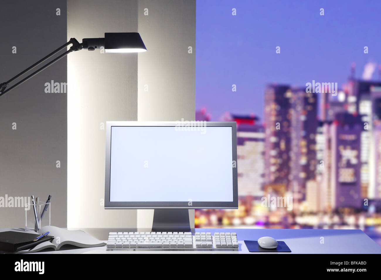 Office desk at night Stock Photo - Alamy