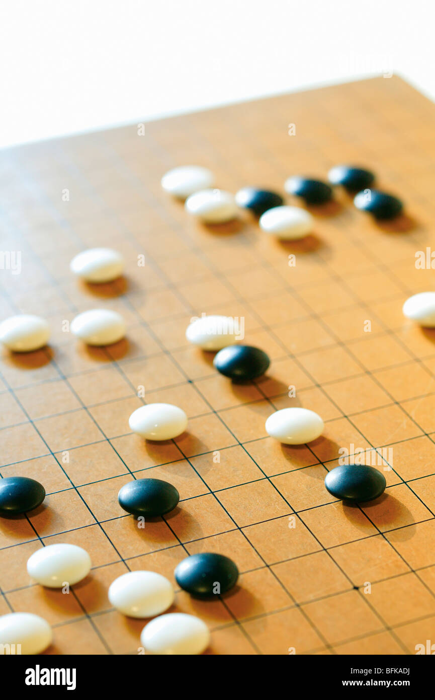 Go table with pieces Stock Photo - Alamy