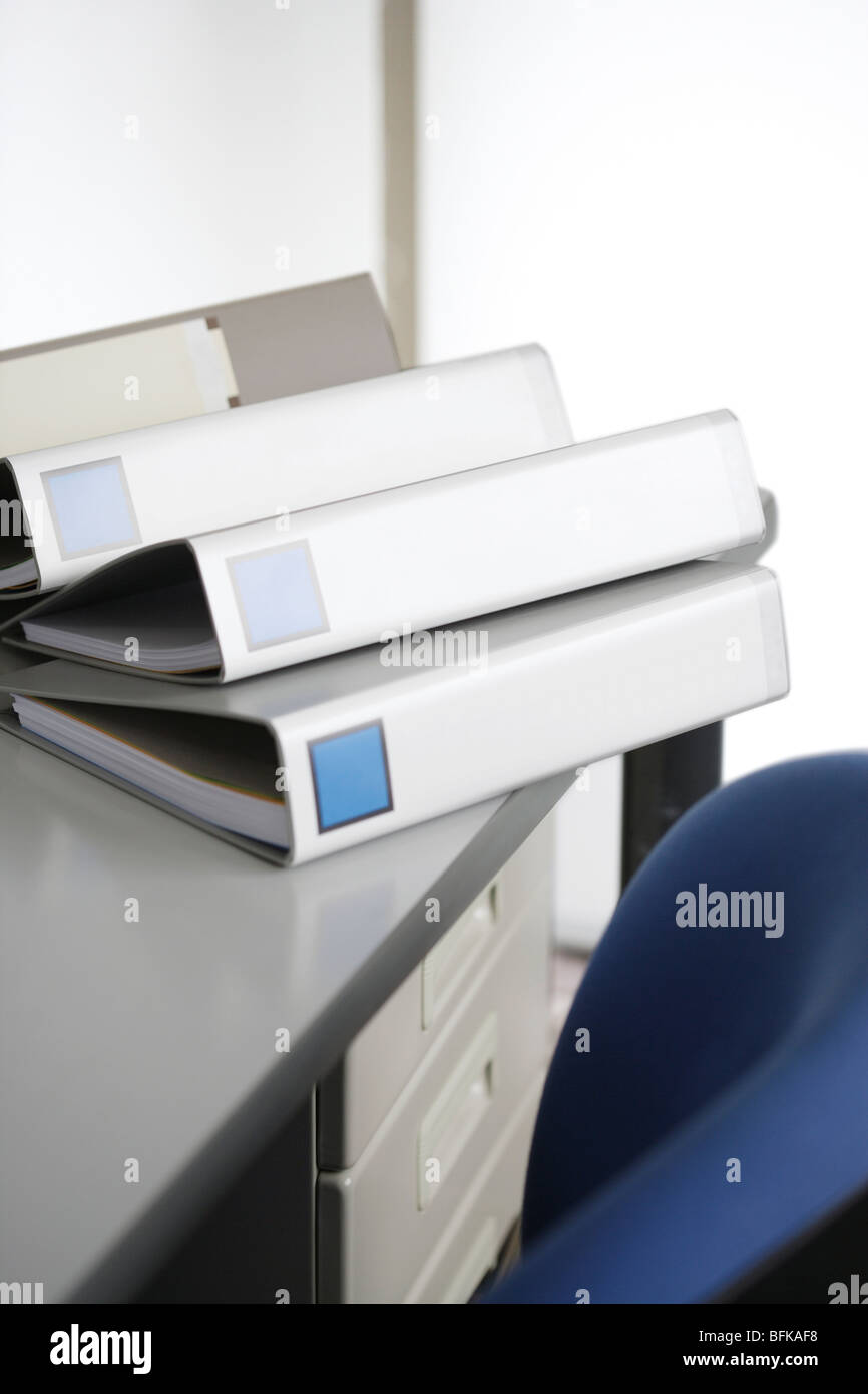 Ring binders on a desk Stock Photo - Alamy