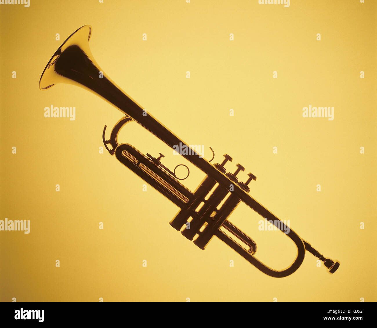 Trumpet colored background Stock Photo - Alamy