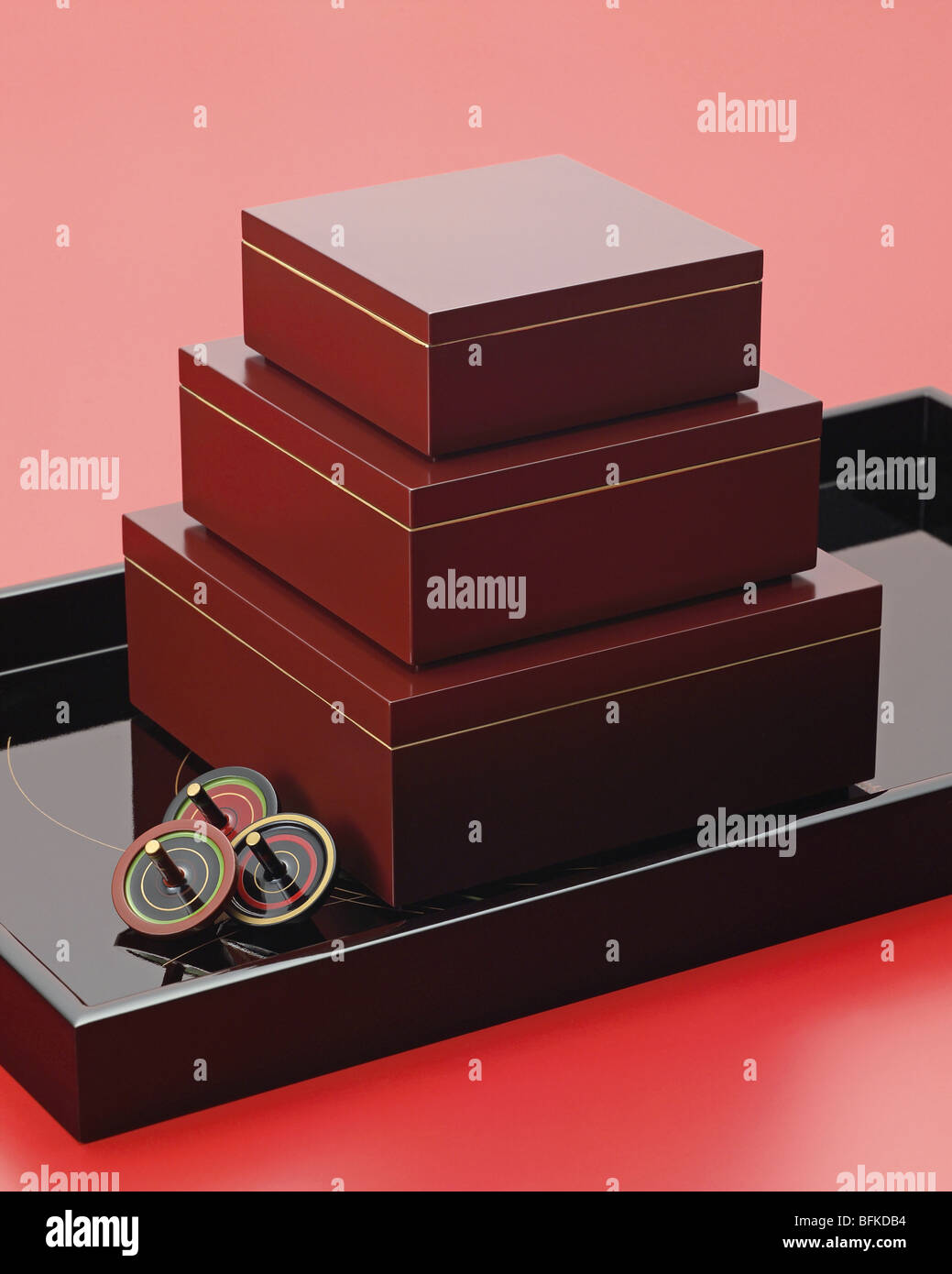 Pile of Japanese wooden boxes red background Stock Photo - Alamy
