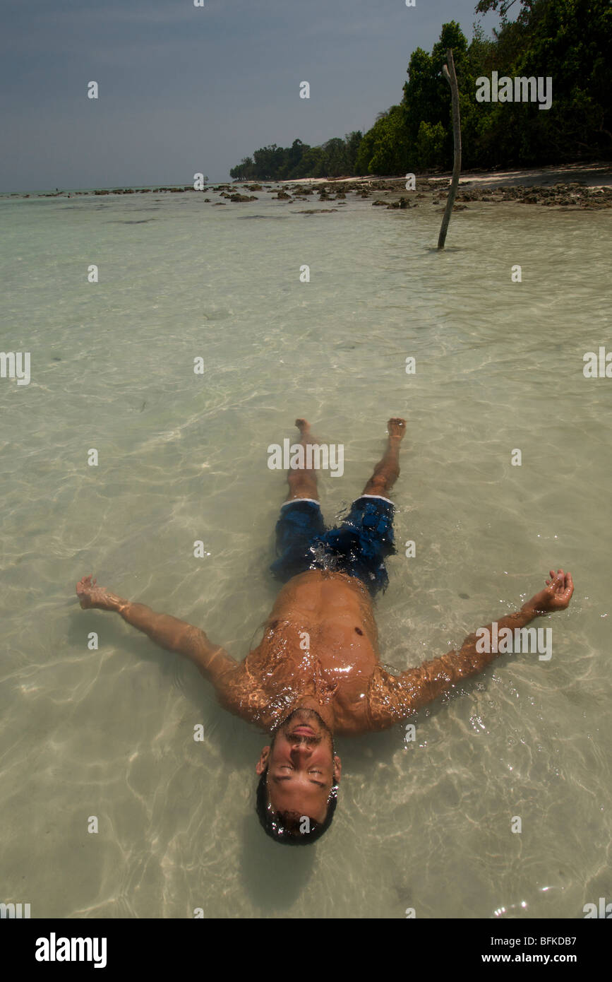 Floating on an Indian beach Stock Photo - Alamy