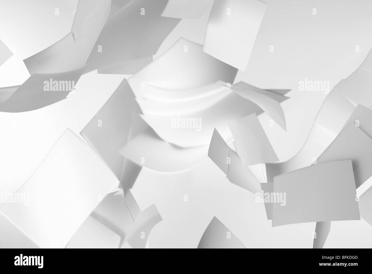 Papers thrown in air white background Stock Photo - Alamy