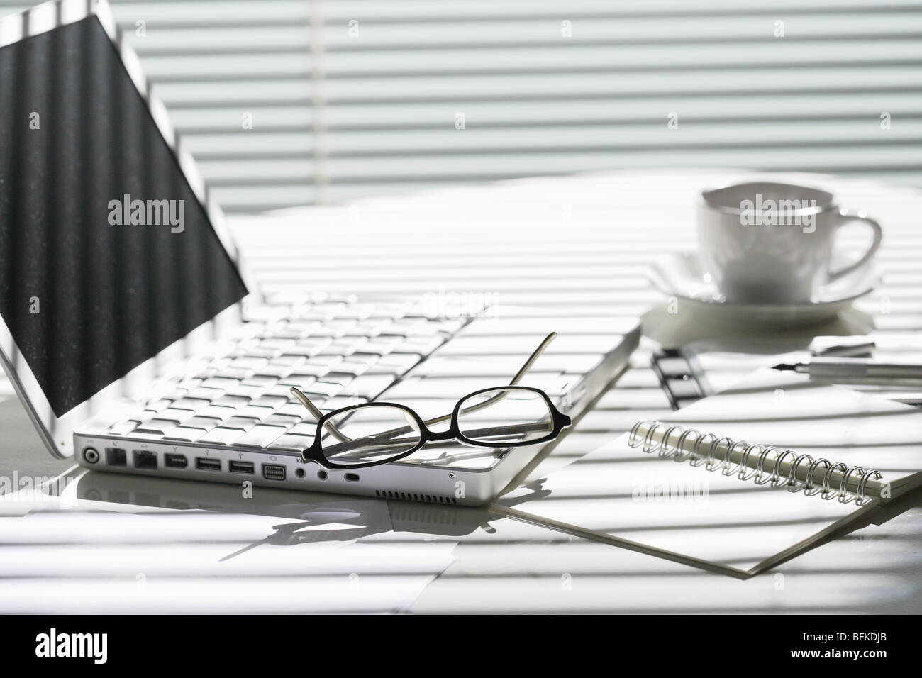 Laptop on desk Stock Photo - Alamy