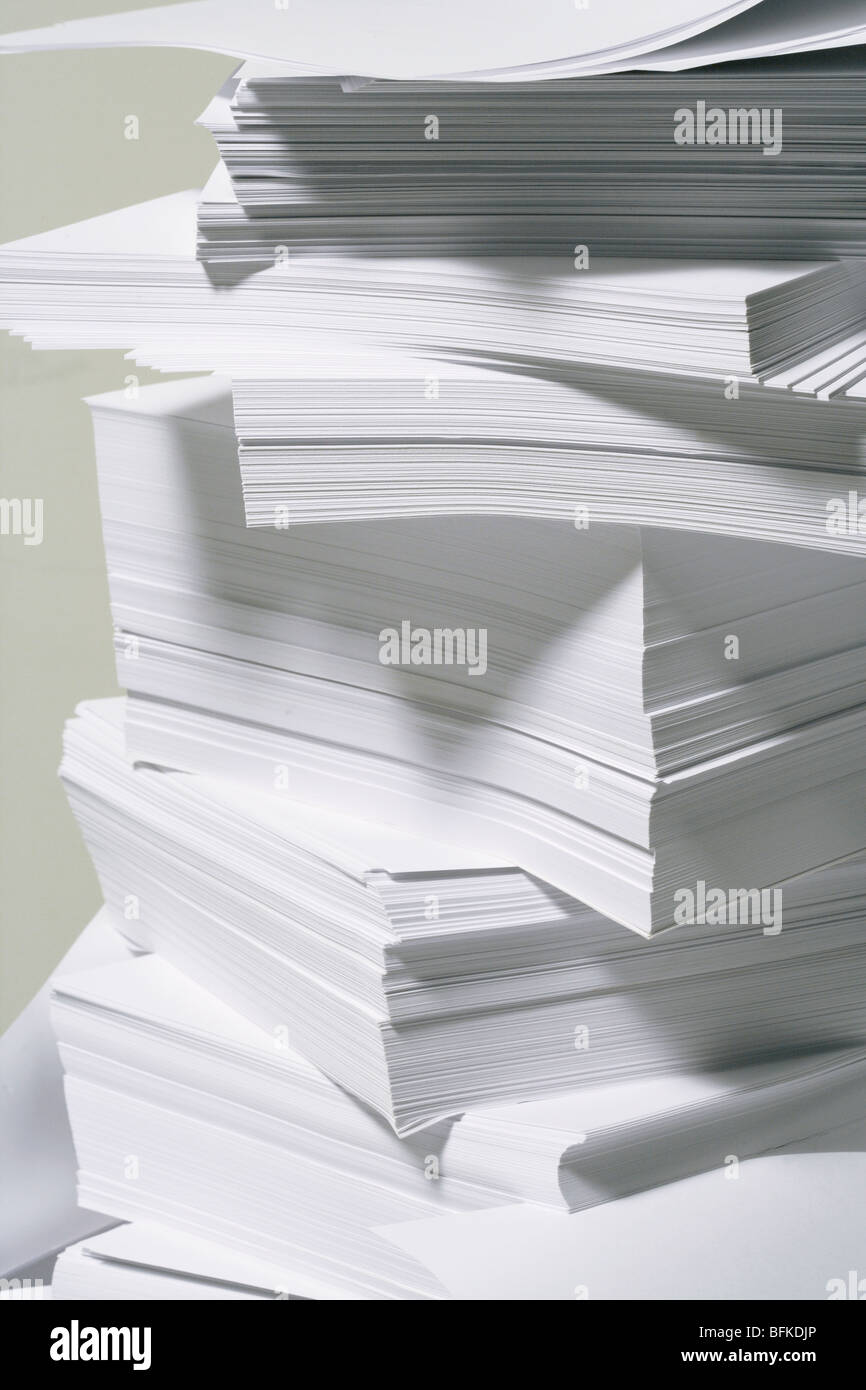 Piled papers close up Stock Photo - Alamy