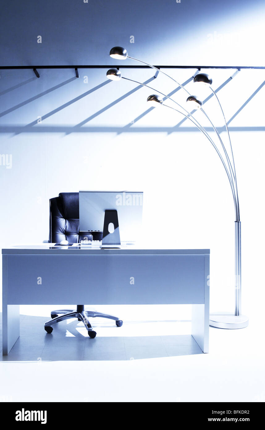 Desk in office white background Stock Photo - Alamy