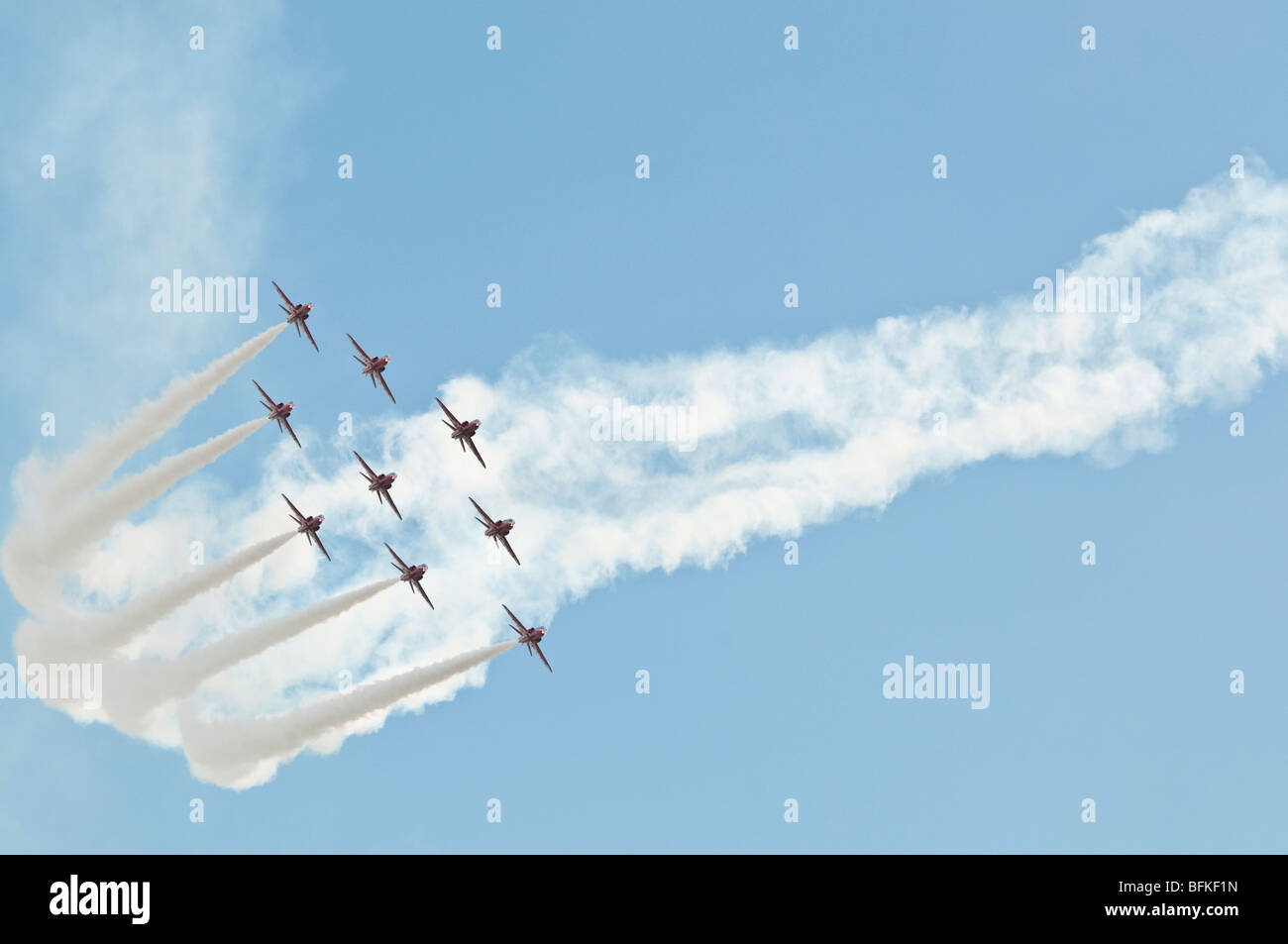 Red Arrows aerobatic team in diamond 9 formation Stock Photo - Alamy