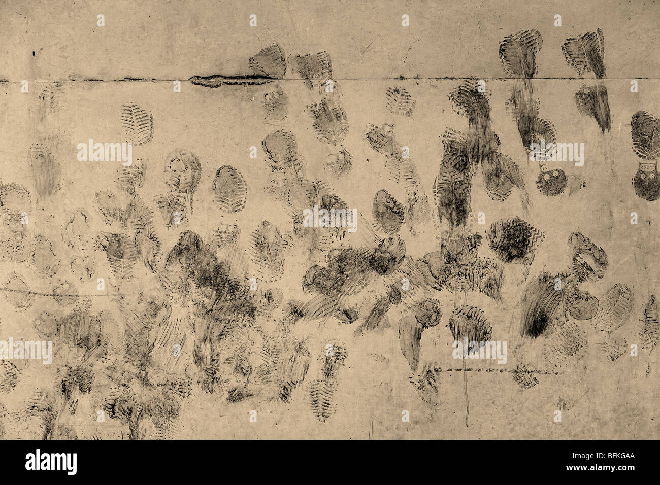 Footprints rising up the wall beneath the Millennium Bridge at The ...