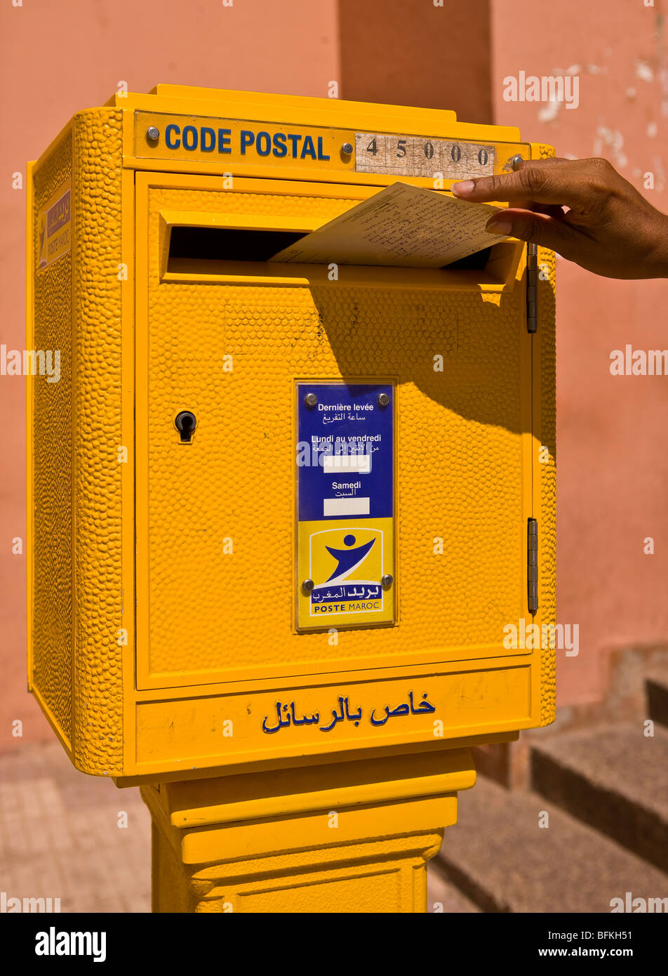 OUARZAZATE, MOROCCO - Mailing postcard in Post office box Stock Photo ...