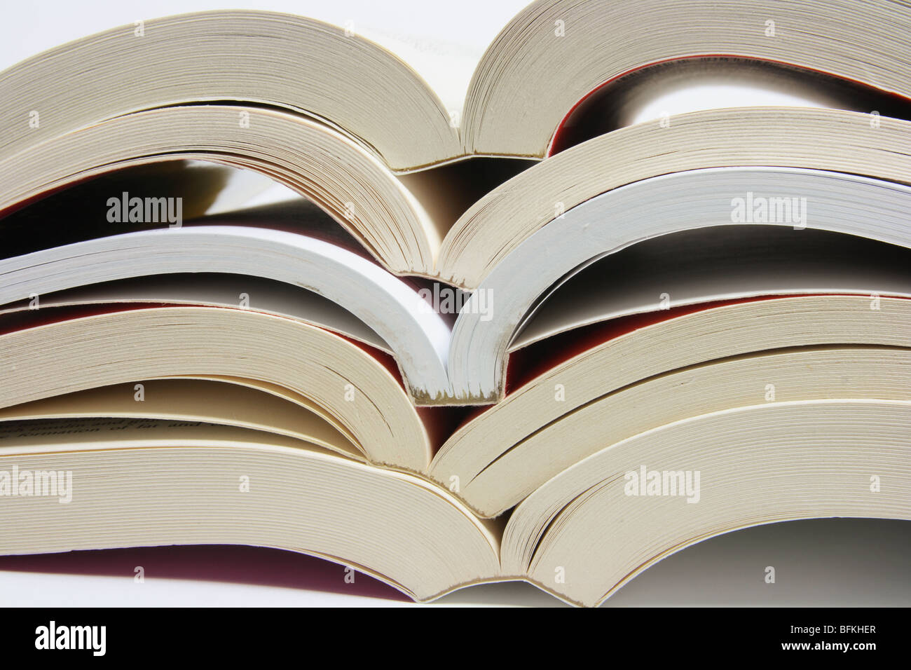 Stack of Open Books Stock Photo - Alamy