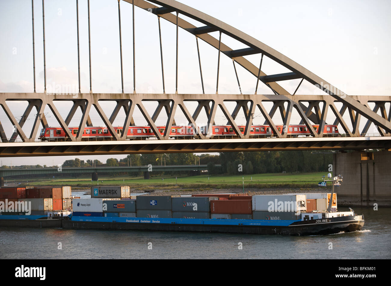 Commercial container barge 'Joline' sailing on the river Rhine under ...
