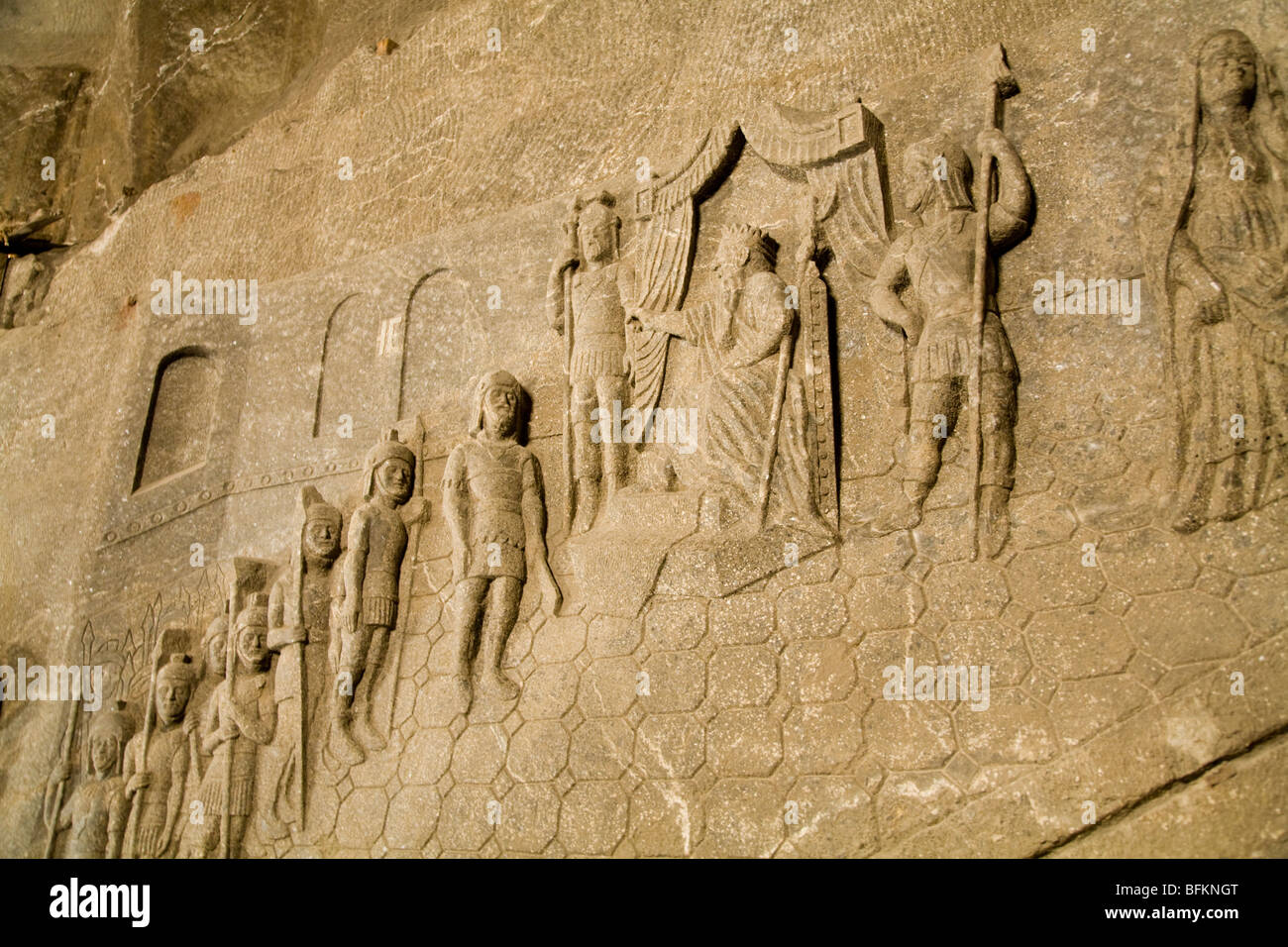 Carving of figures of miners on the wall in the Saint Kinga’s Chapel in ...
