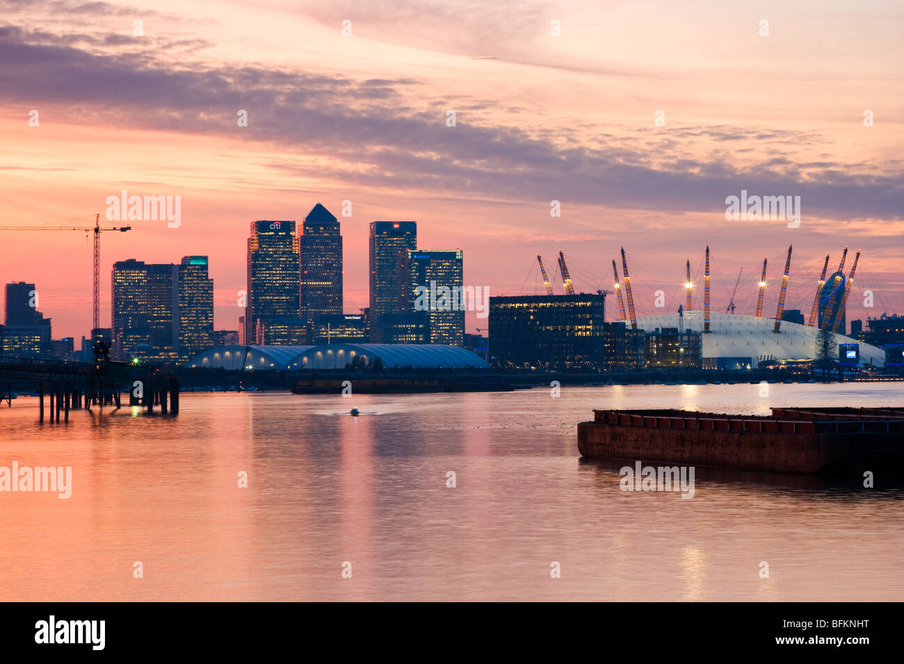 Dramatic pink sunset picture of Docklands and the Millenium Dome O2 ...
