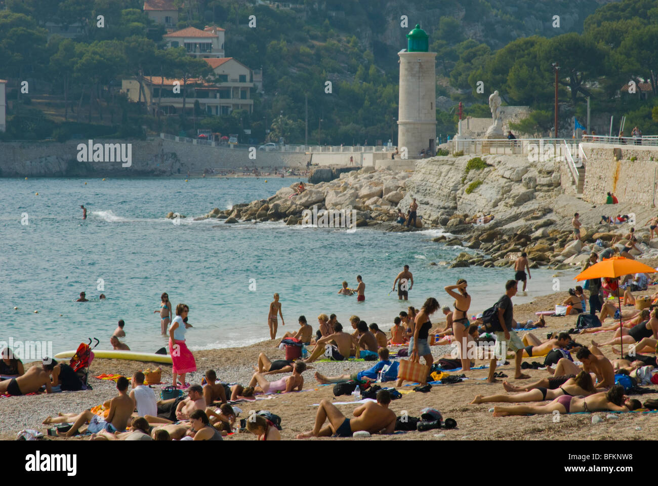 Busy beach of bathers in Cassis Southern France Stock Photo - Alamy