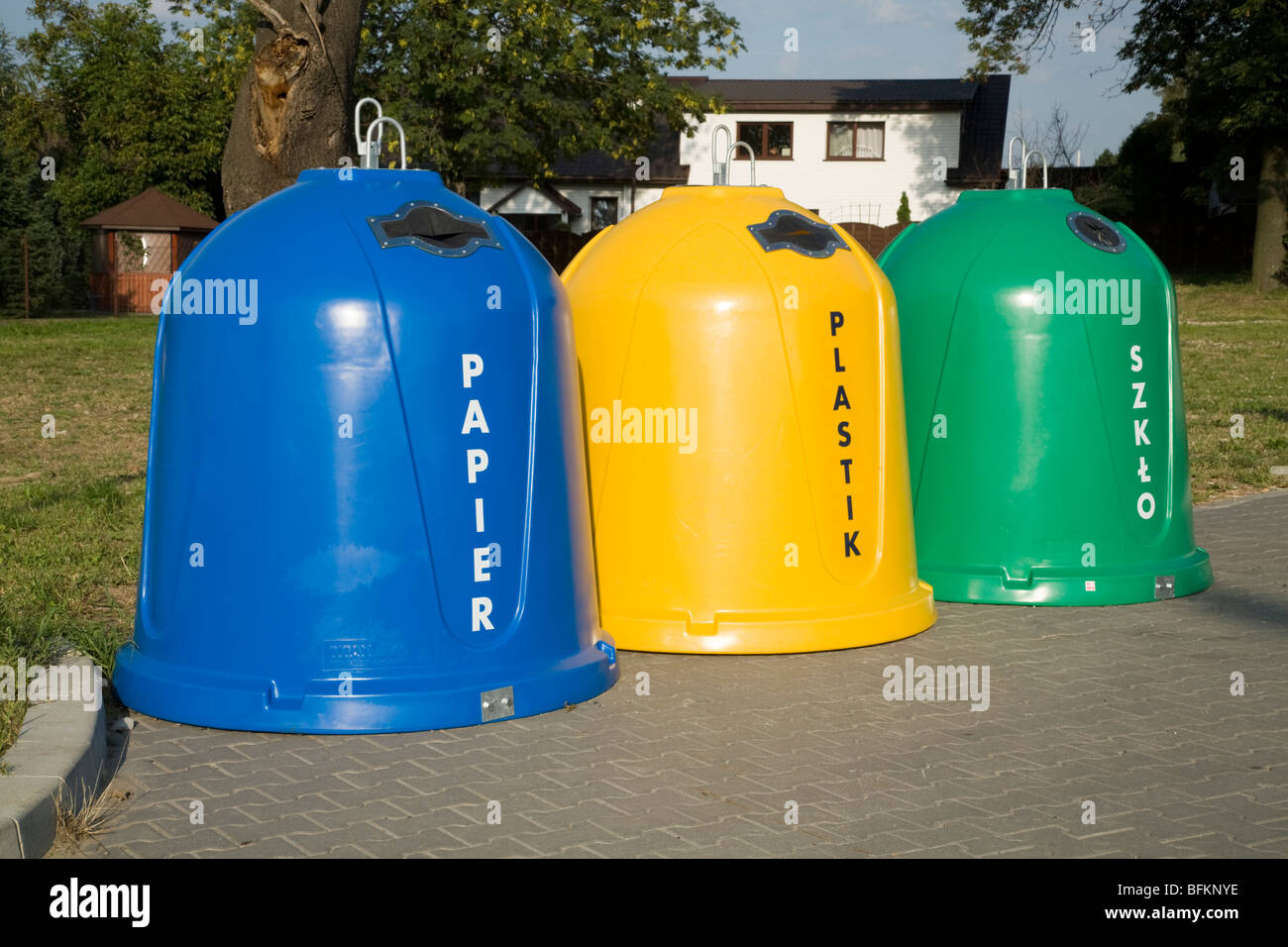 Clear glass bottle recycling bins hi-res stock photography and images - Alamy