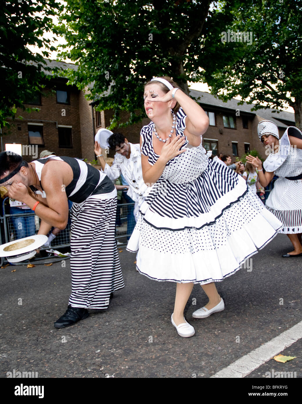 Dancers from the London School of Samba float dance in the street at ...