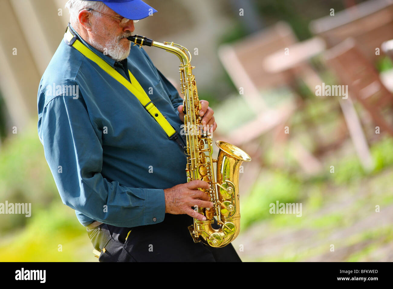 Saxophone player at a party Stock Photo - Alamy