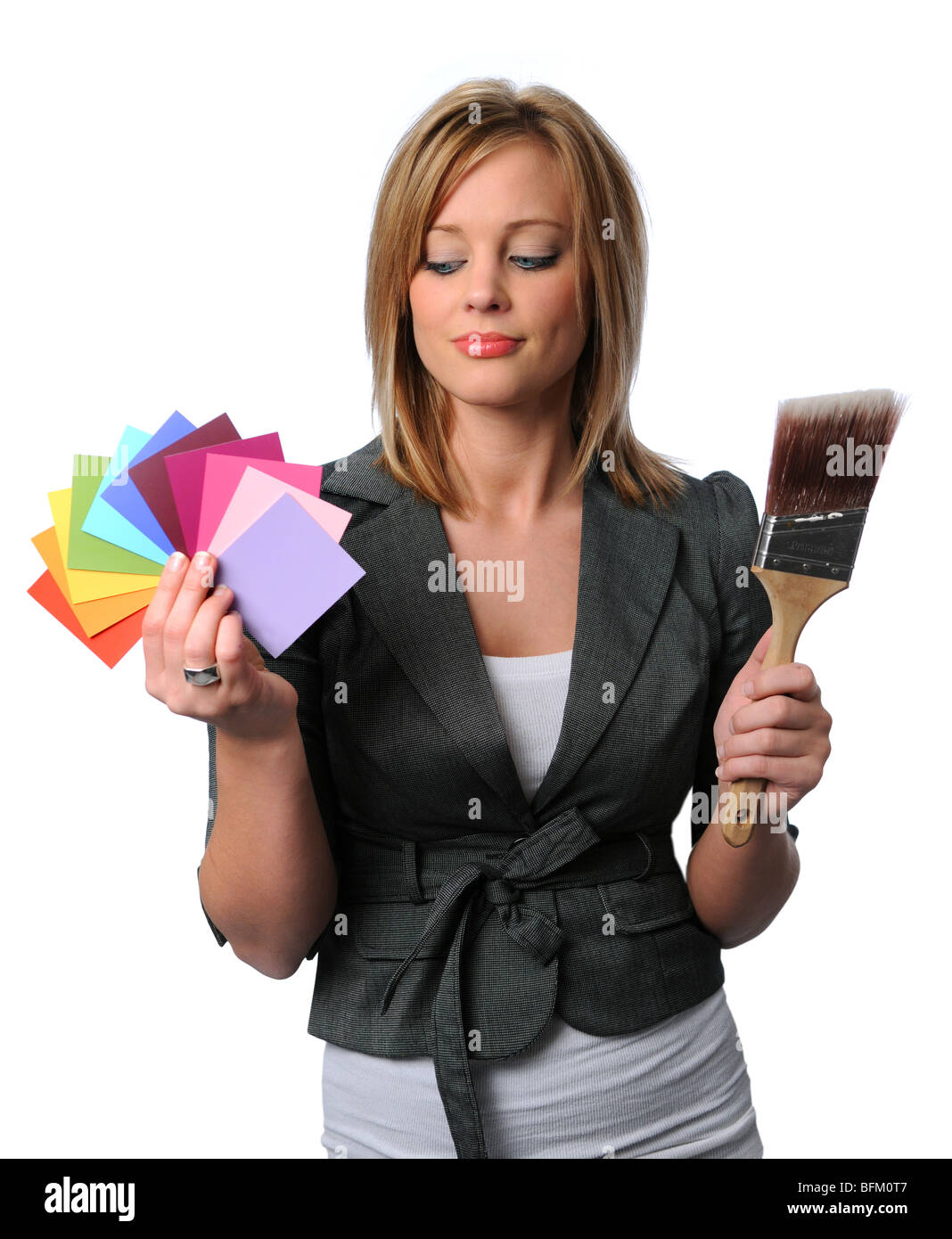 Gorgeous girl with paint brush and color swatches Stock Photo - Alamy