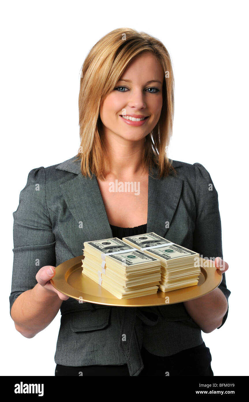 Beautiful young woman with money on a platter Stock Photo - Alamy