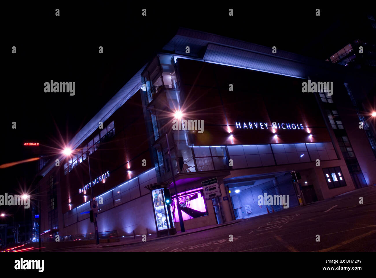 Harvey Nichols and the Arndale Centre at night, central Manchester, UK ...