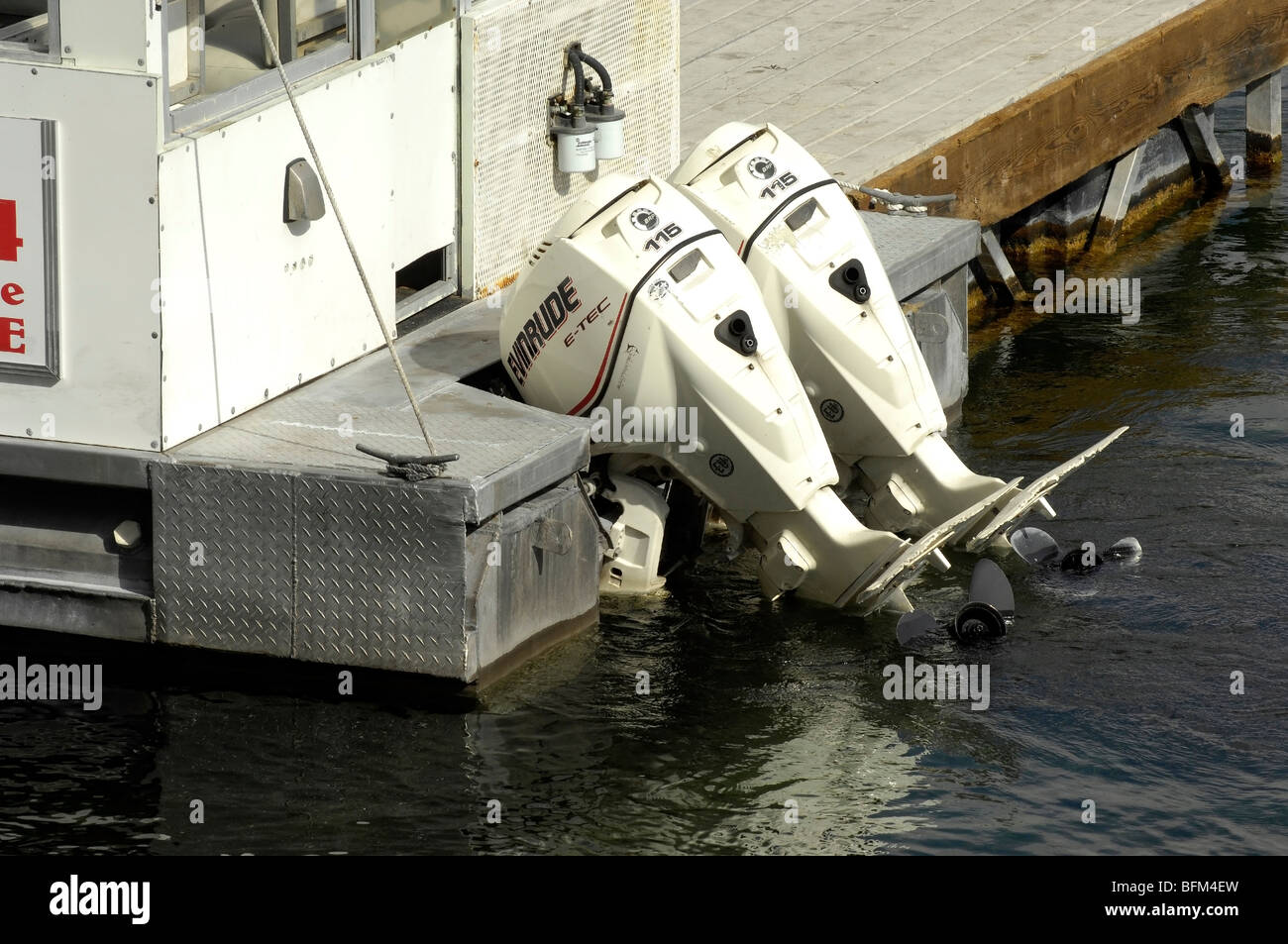 Twin outboard motors Stock Photo - Alamy