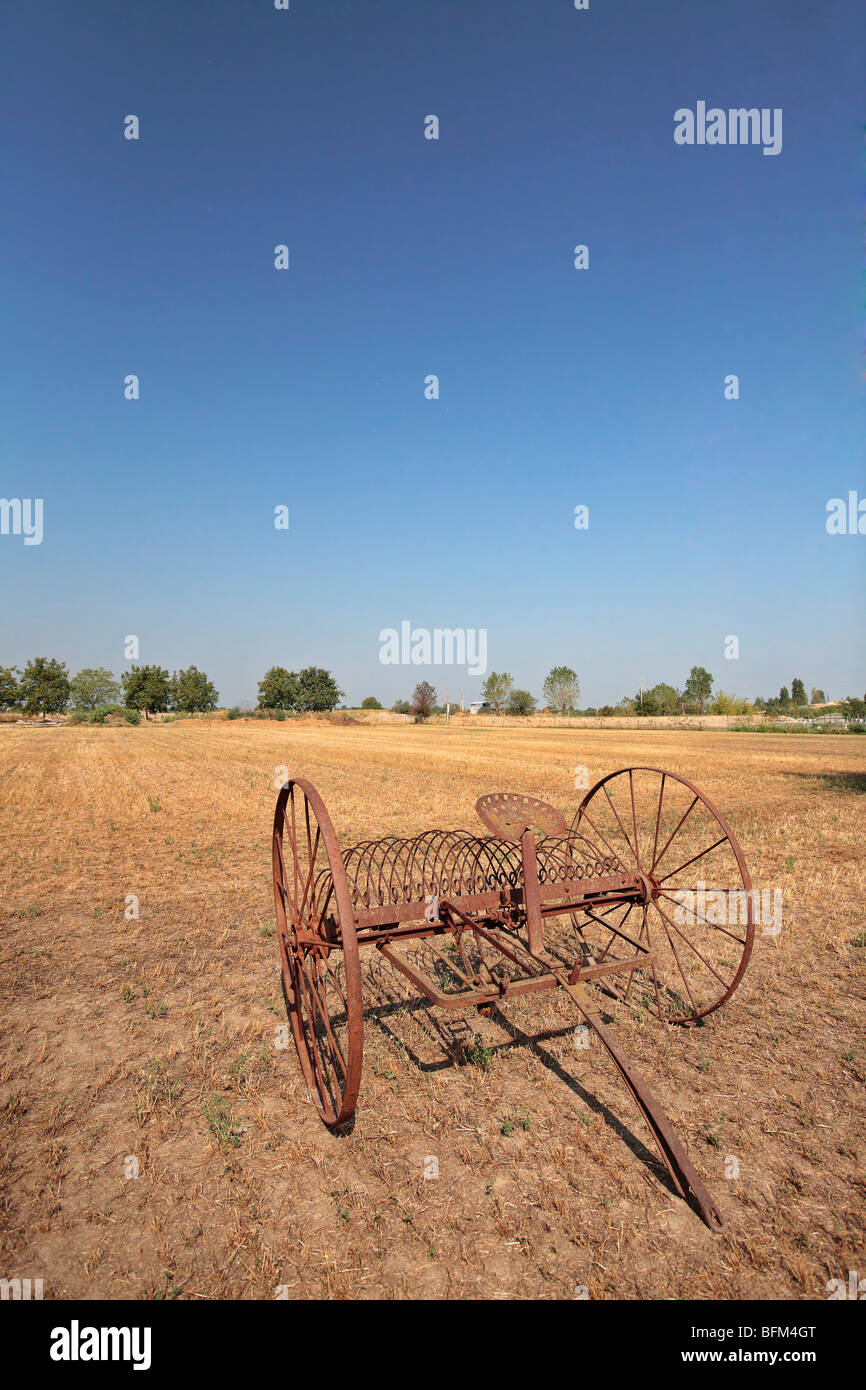 Old farm equipment Stock Photo - Alamy