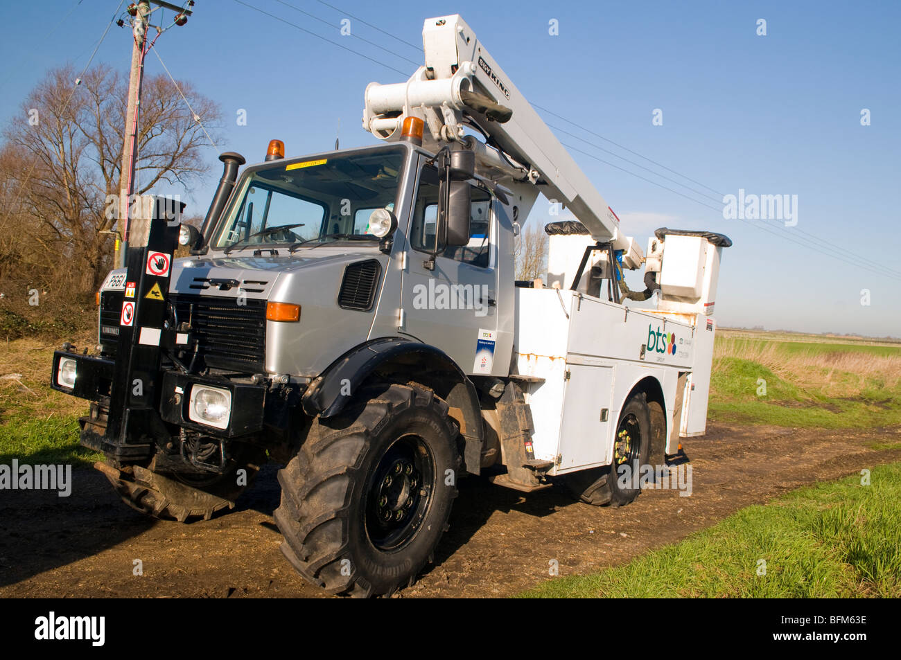 Mercedes Unimog U1200 utility vehicle with simon hoist on the fens near ...