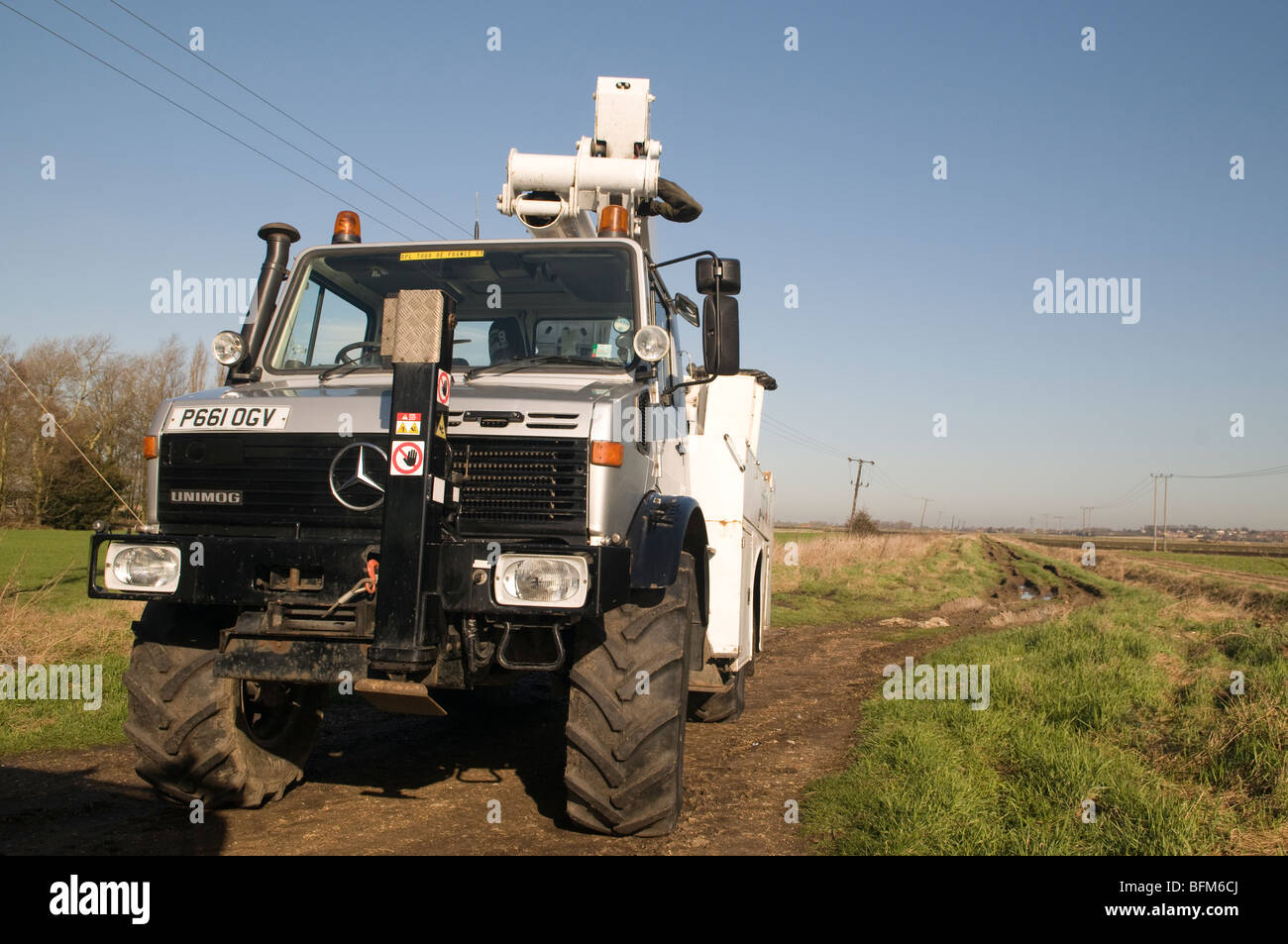 Mercedes Unimog U1200 utility vehicle with simon hoist on the fens near ...