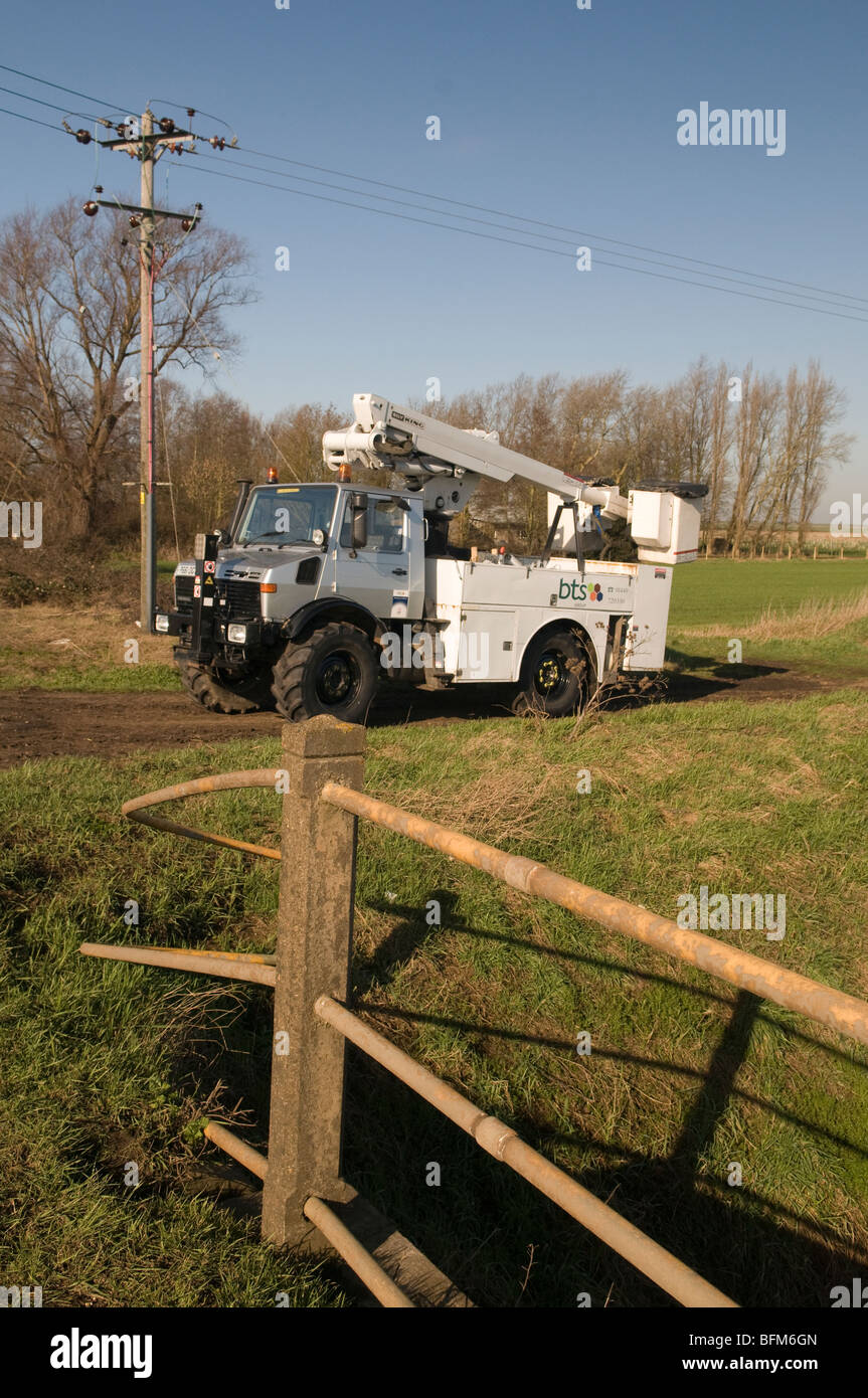 Mercedes Unimog U1200 utility vehicle with simon hoist on the fens near ...