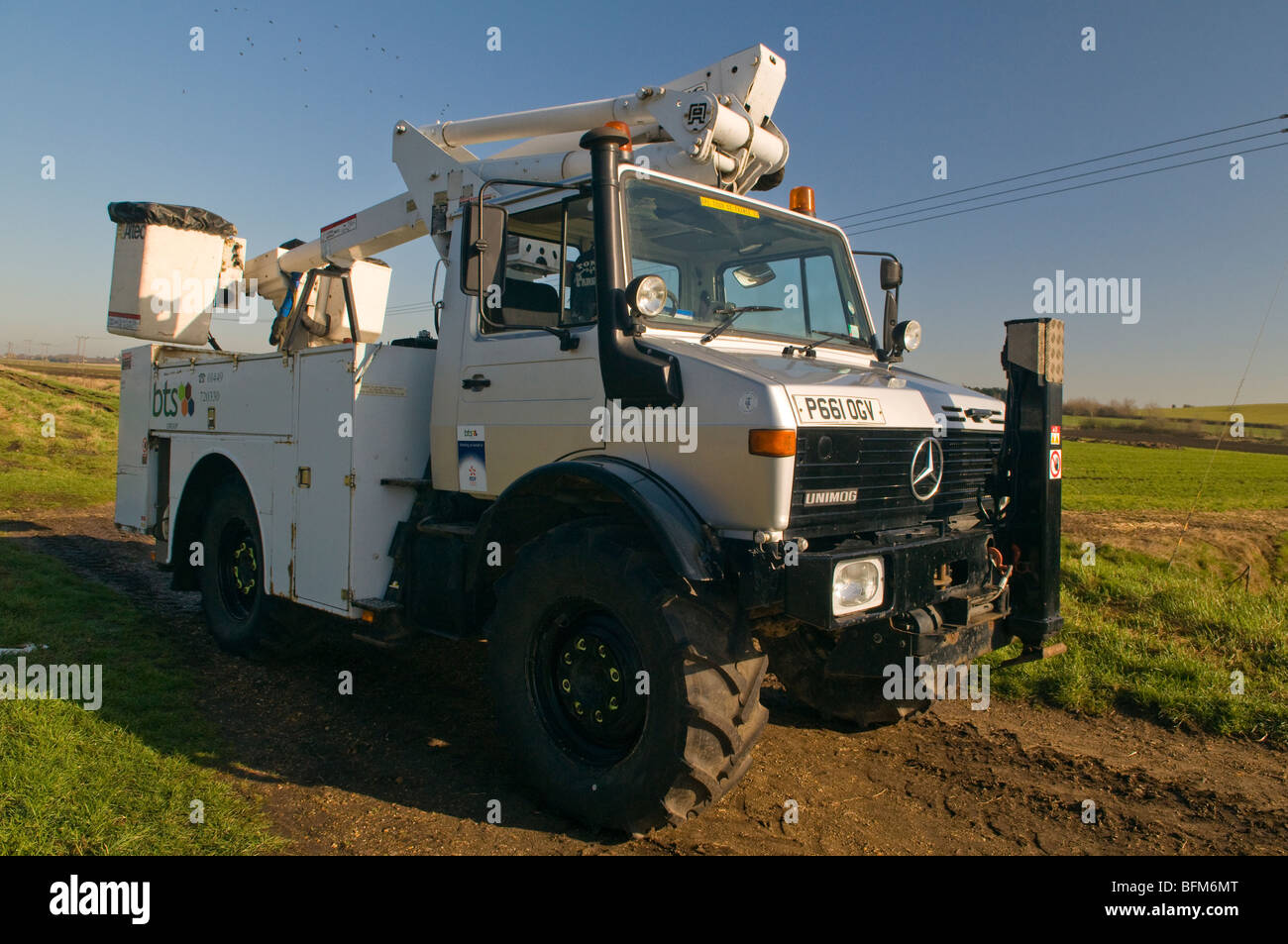 Mercedes Unimog U1200 utility vehicle with simon hoist on the fens near ...