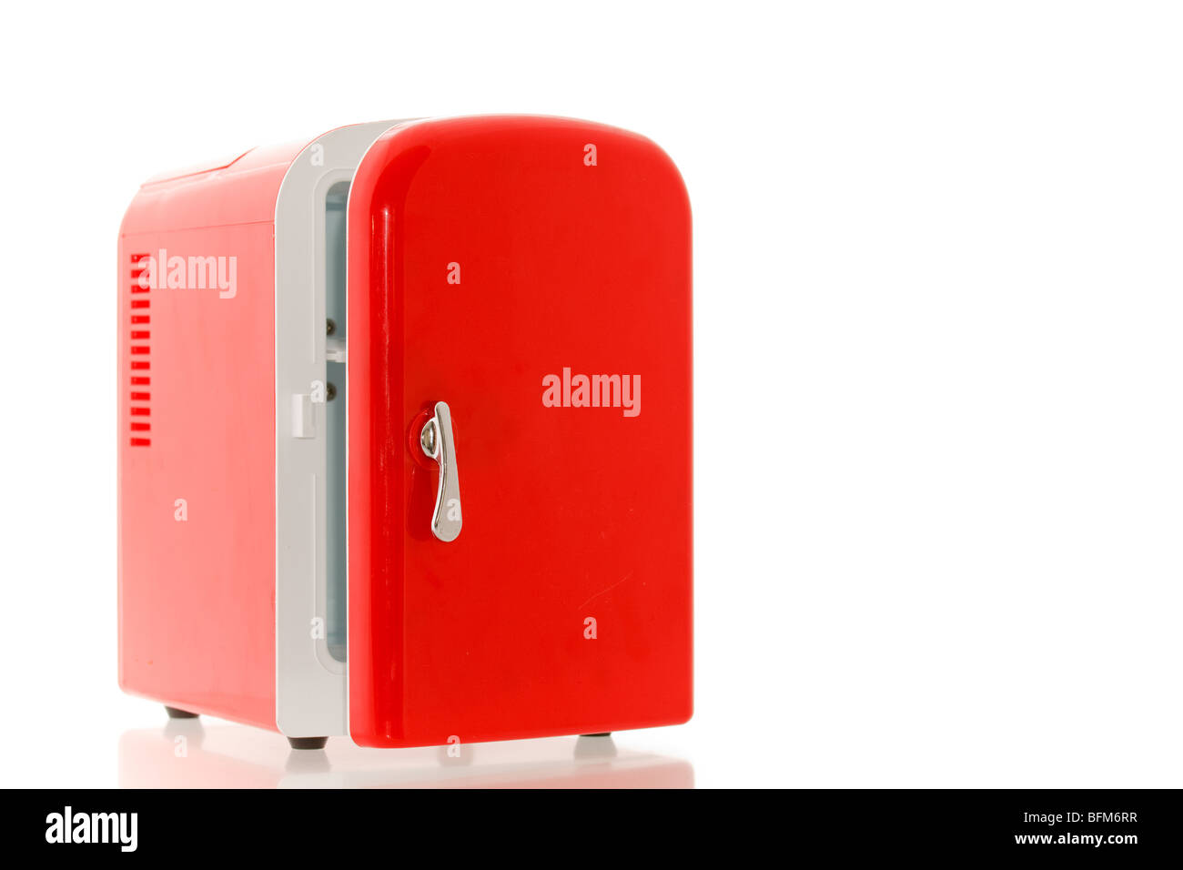 Shiny bright red miniature fridge Stock Photo - Alamy