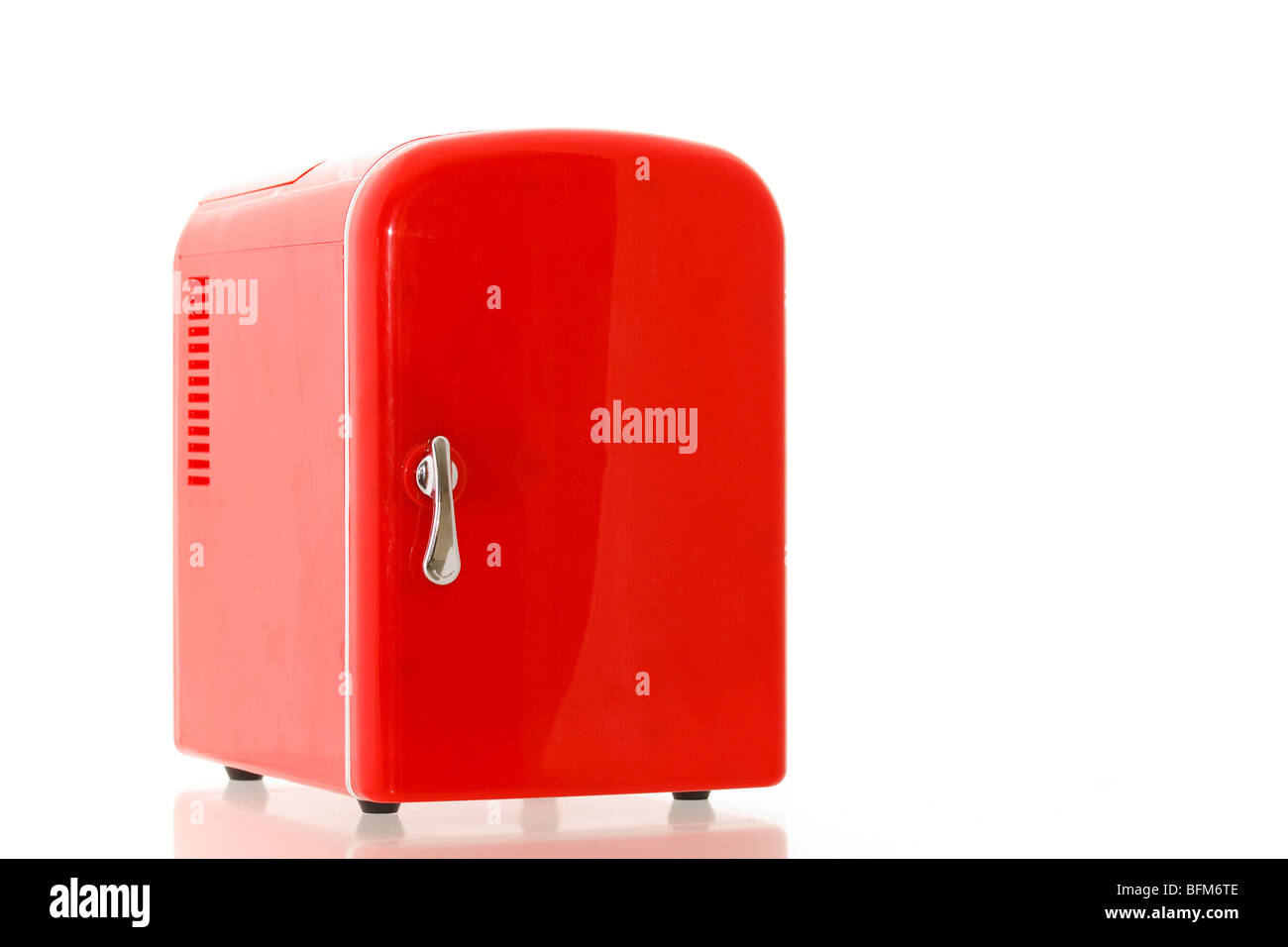 Shiny bright red miniature fridge Stock Photo - Alamy