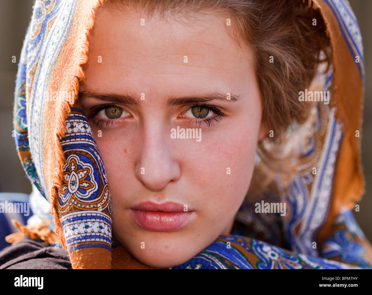 Veiled girl looking intensely into the camera Stock Photo - Alamy