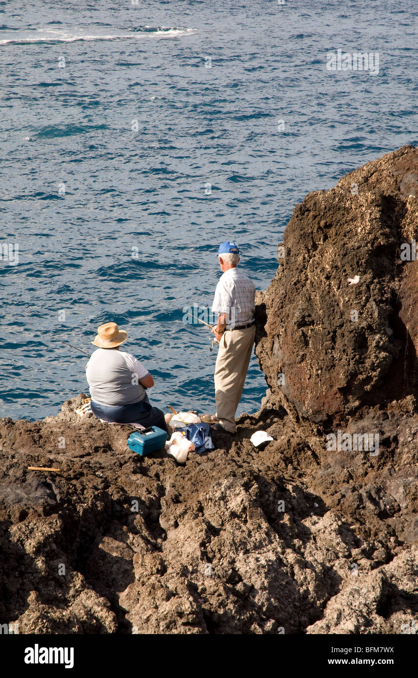 Men fishing in Tenerife Canary Islands Stock Photo - Alamy