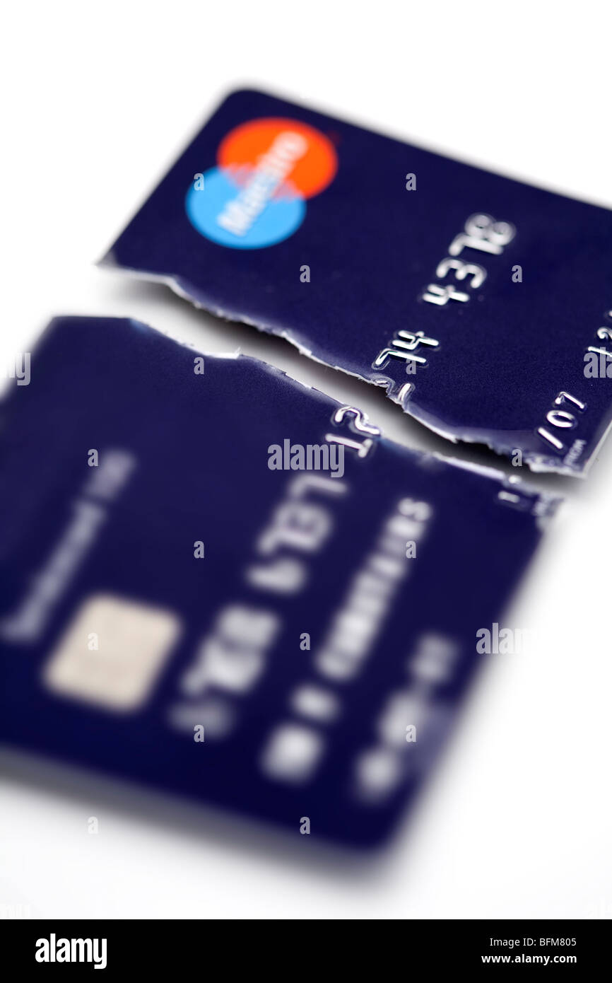 Ripped credit card Stock Photo - Alamy