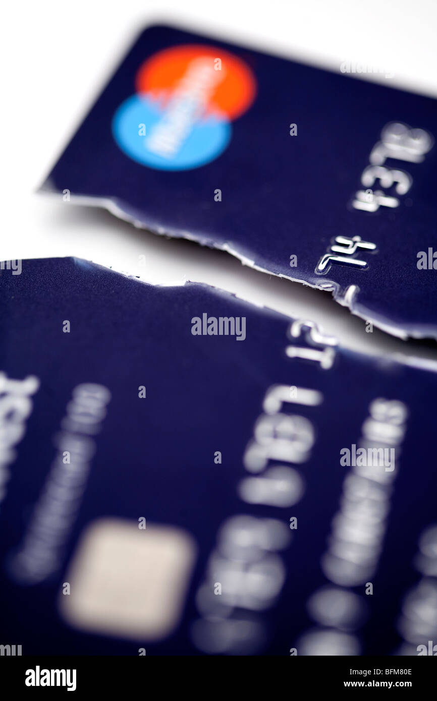 Ripped credit card Stock Photo - Alamy