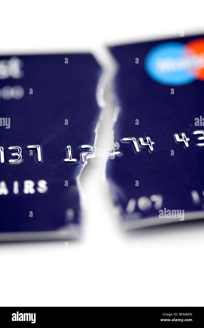 Ripped credit card Stock Photo - Alamy