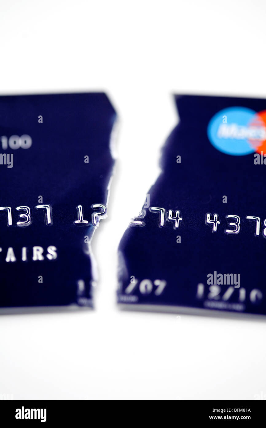 Ripped credit card Stock Photo - Alamy