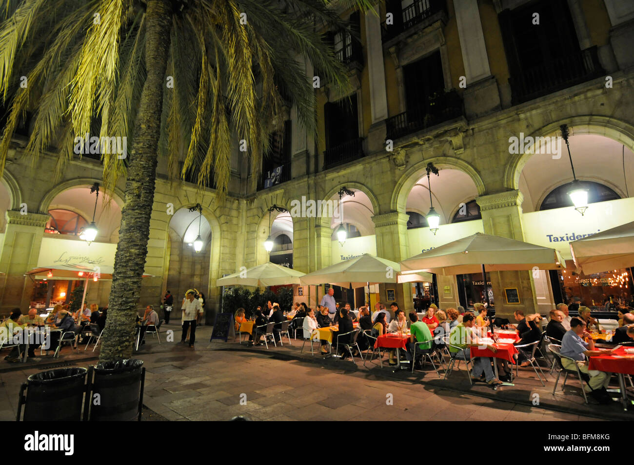 People going-out at night in the Neo Classical Placa Reial, in the ...