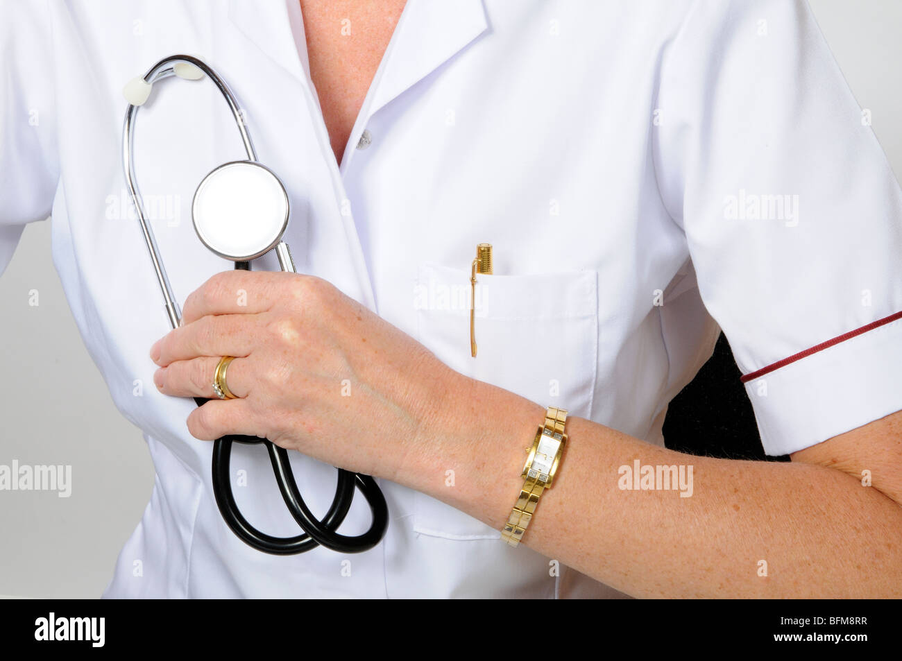 Stethoscope being held by a nurse Stock Photo - Alamy