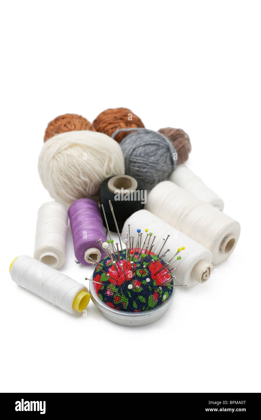 Sewing tools isolated on white background Stock Photo - Alamy