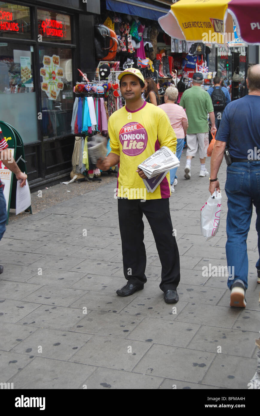 London Lite free newspaper distributor Stock Photo - Alamy